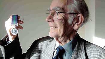 Noel gets his medal - 50 years late! | tenby-today.co.uk