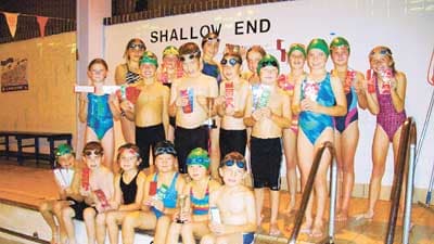 Dolphins clock up the miles for charity swim | tenby-today.co.uk