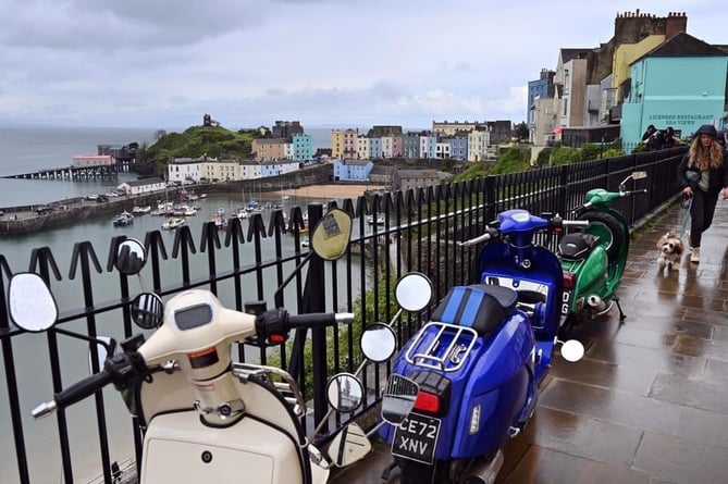 WATCH: Hundreds of scooters enjoy a ride around the seaside town of ...