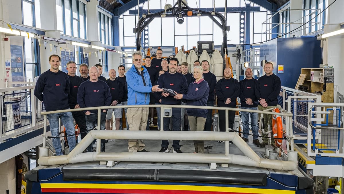 Tenby RNLI lifeboat crew presented with new jumpers | tenby-today.co.uk