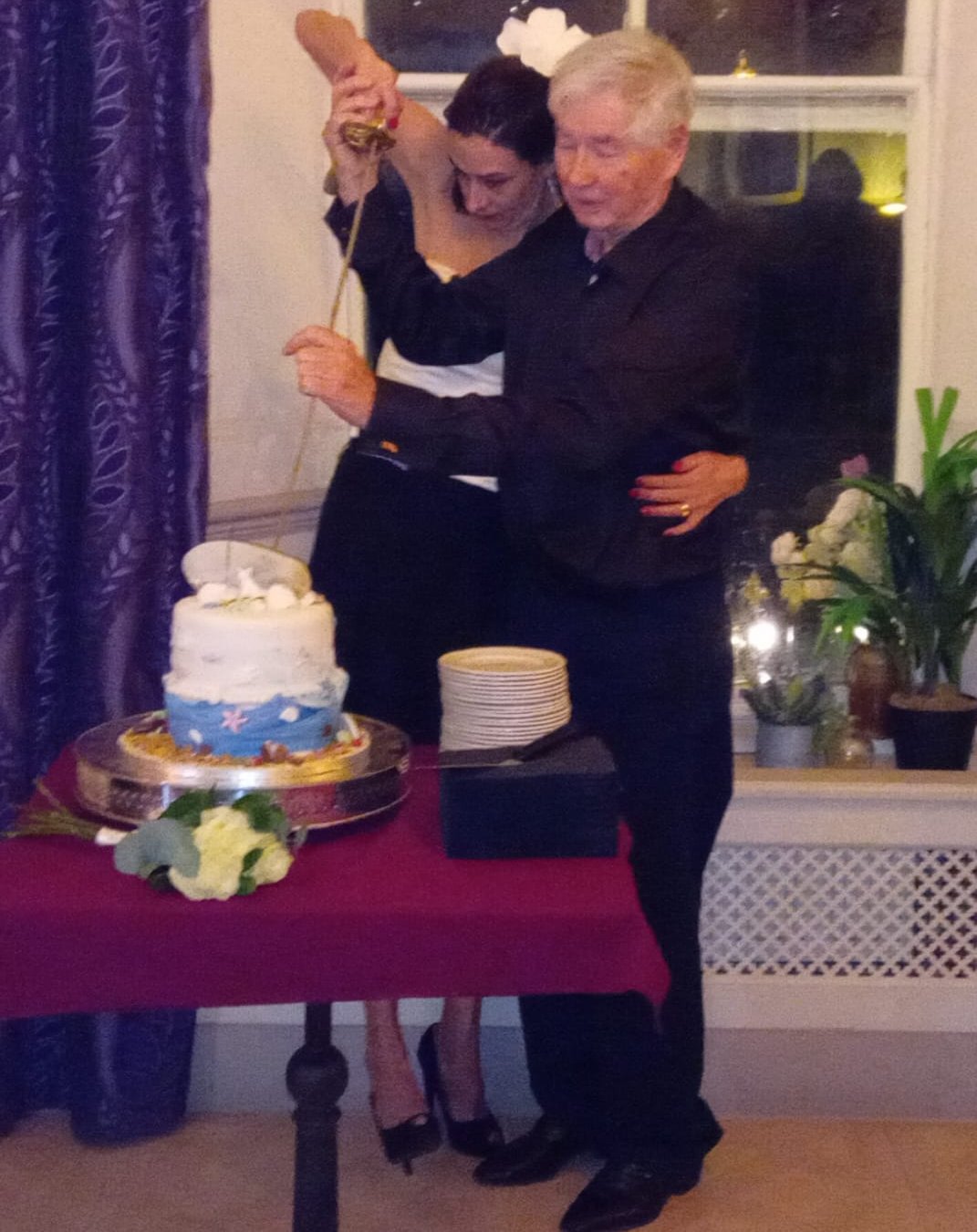 The sword in the cake - Cyril and Louise hold reception at Tenby ...