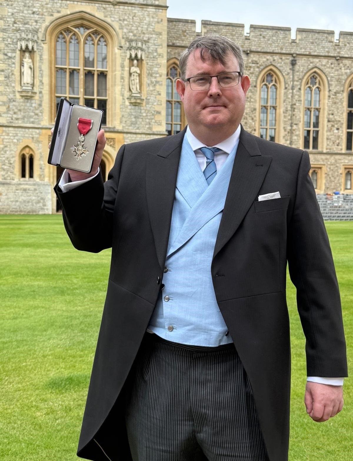 Wales NSPCC Volunteer Hywel Peterson Honoured with MBE by Prince ...