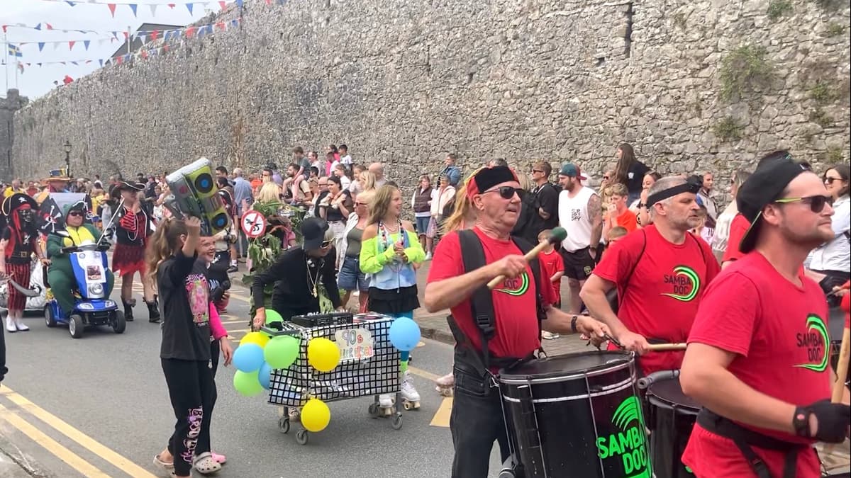 WATCH: Tenby Carnival's colourful parade through the seaside town ...